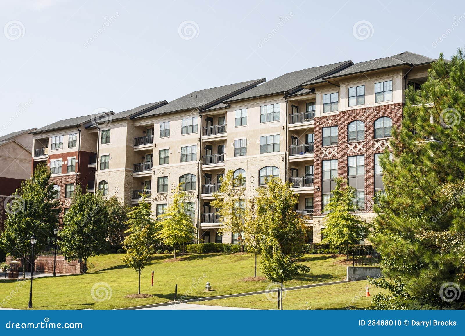 Red and Tan Brick Condos stock photo. Image of building - 28488010