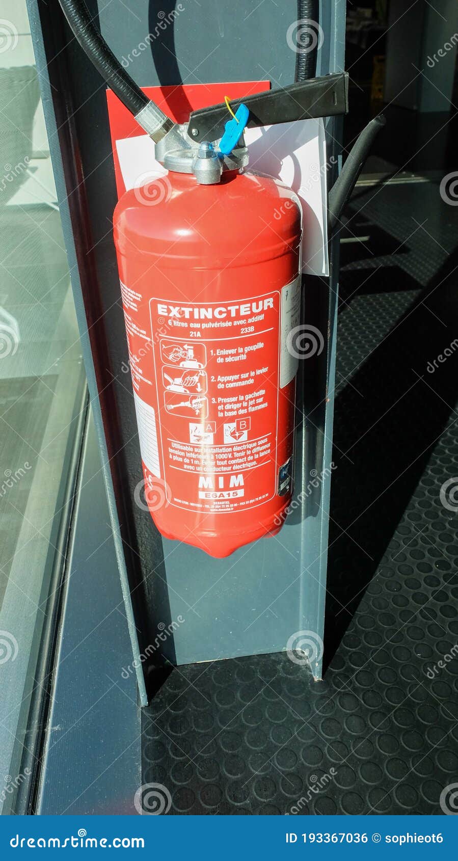 Red Tank of Fire Extinguisher. Fire Extinguishing System Editorial ...
