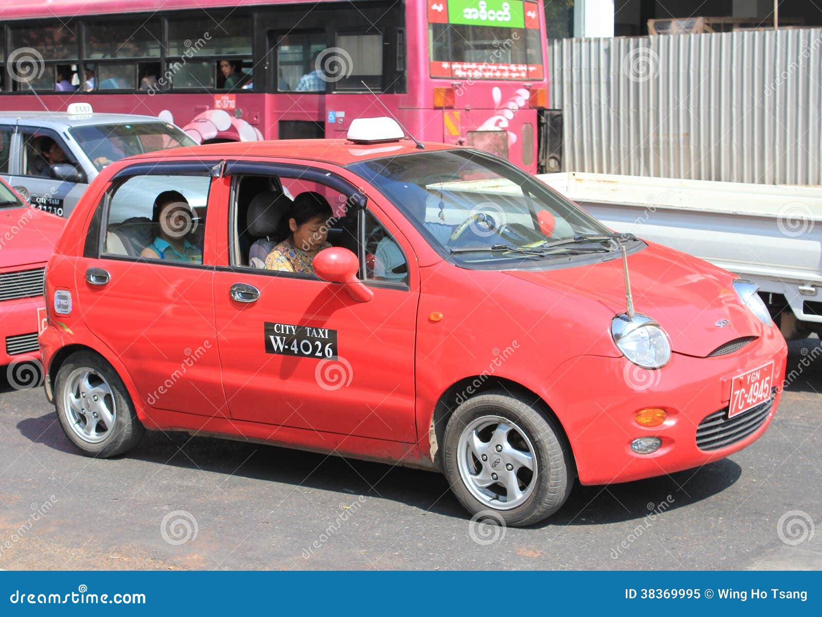 Red taxi in Yangon editorial image. Image of buildings - 38369995