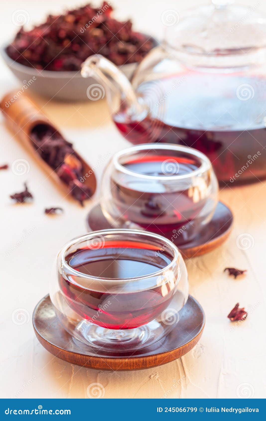 Red Tea Karkade or Hibiscus in Glass Cups and Glass Tea Pot, Vertical ...