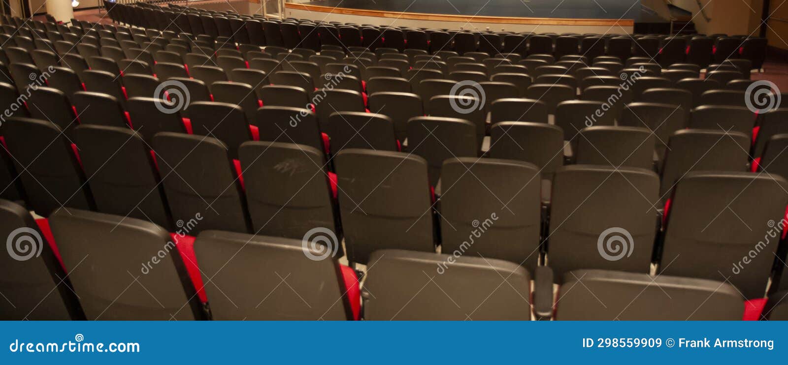 Red theater seats in rows stock image. Image of theatre - 298559909