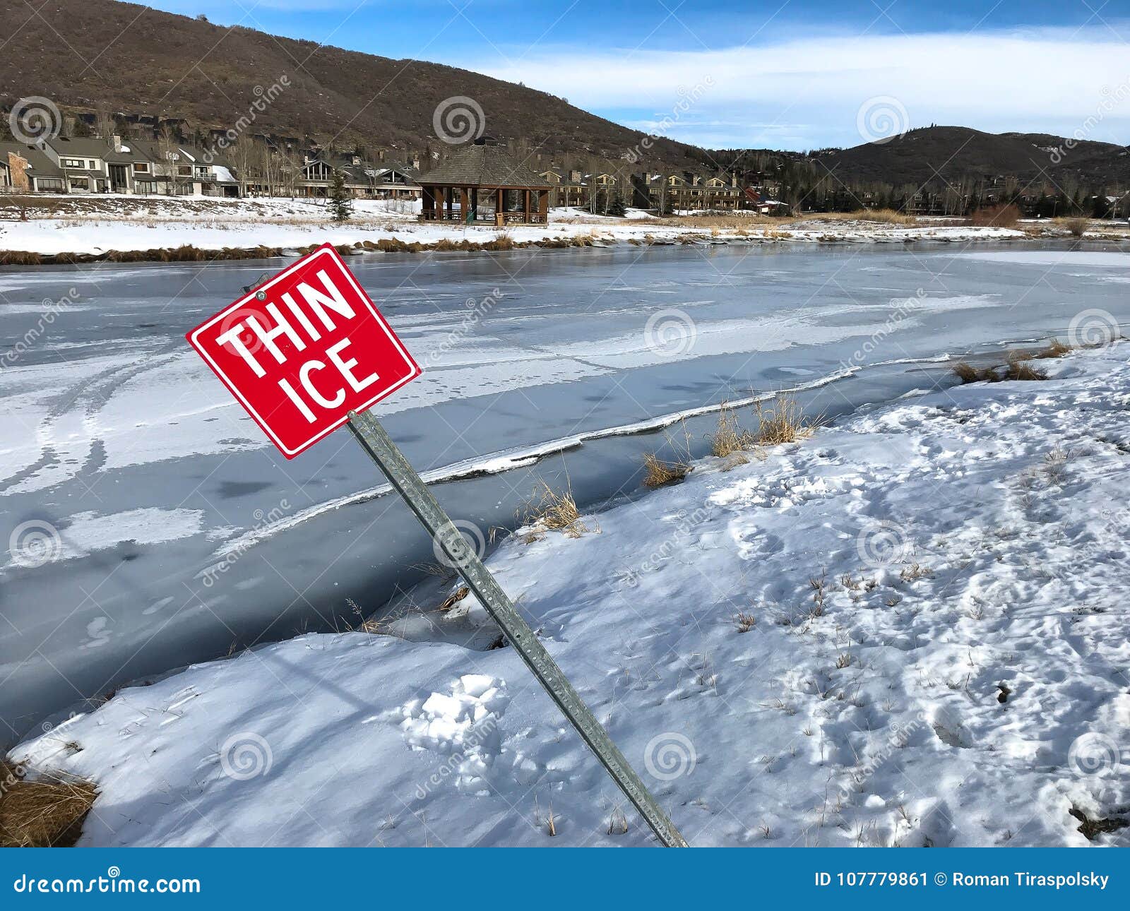 Red `Thin Ice` sign stock image. Image of city, danger - 107779861