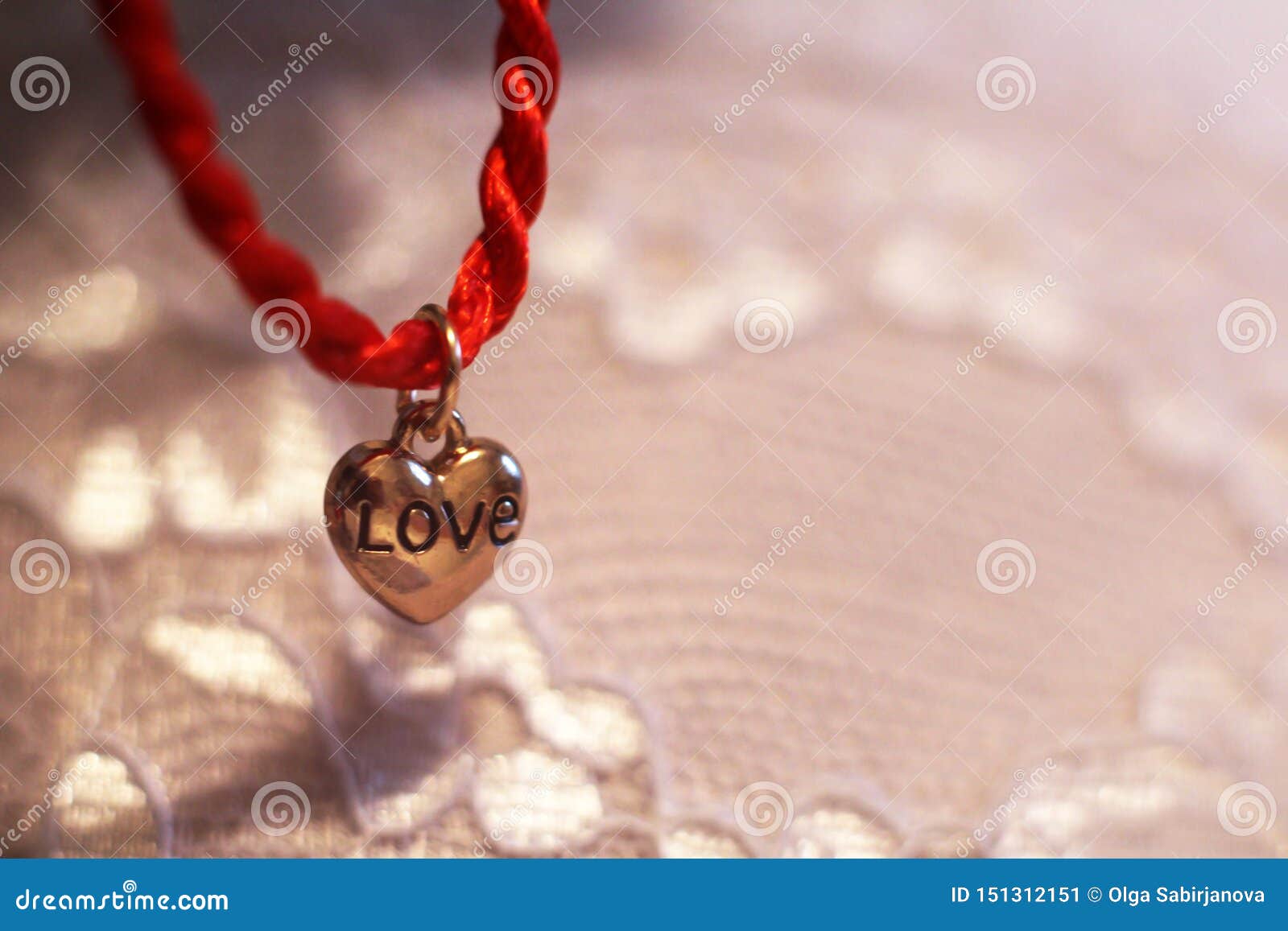 Red Thread on Hand with a Heart of Gold Stock Image - Image of ornament ...