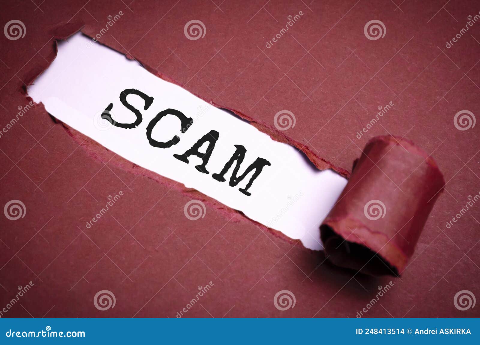 Red Torn Paper with a Text of Scam on White Cardboard Stock ...