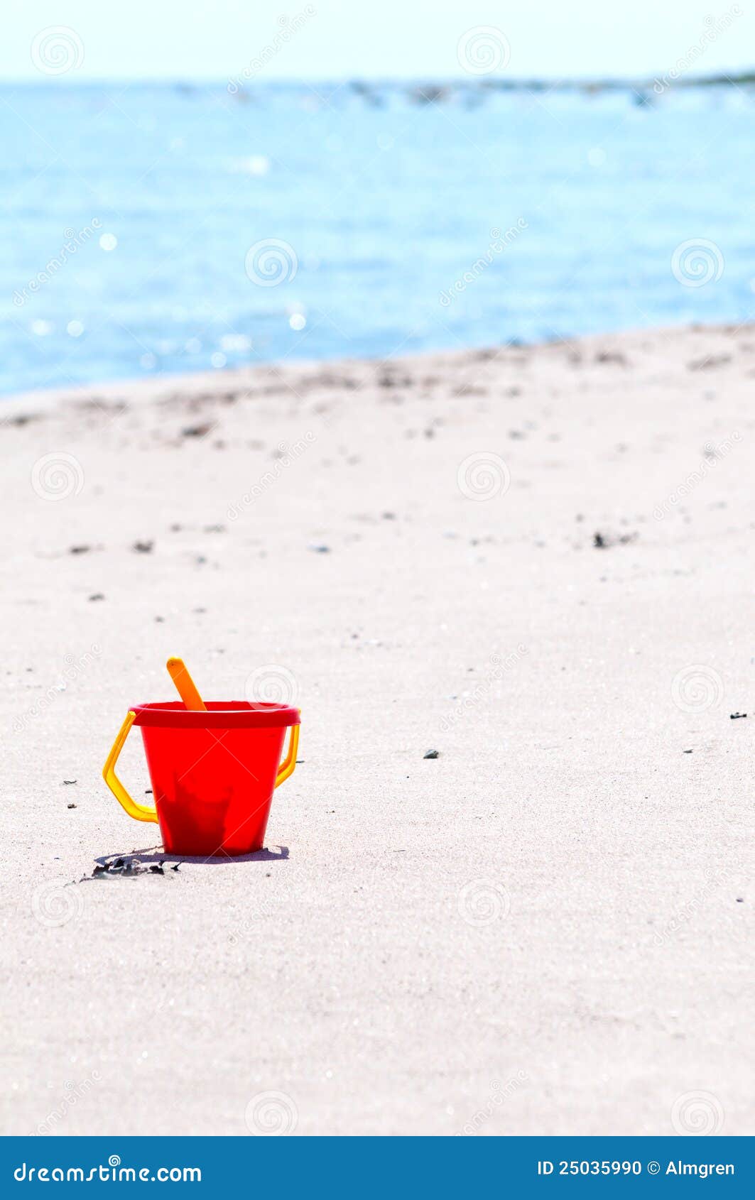 Red Toy Bucket on the Beach Stock Photo - Image of kids, enjoyment ...