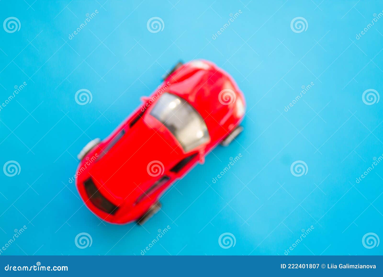 Red toy car stock image. Image of blue, idea, automobile - 222401807
