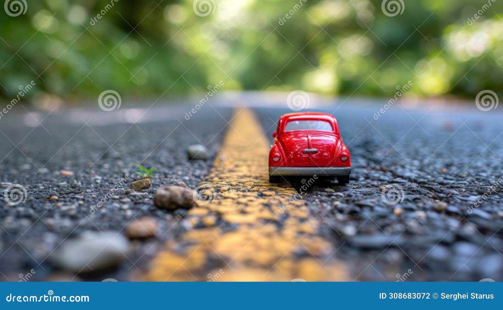 A Red Toy Car is Driving Down a Road with Rocks and Trees, AI Stock ...
