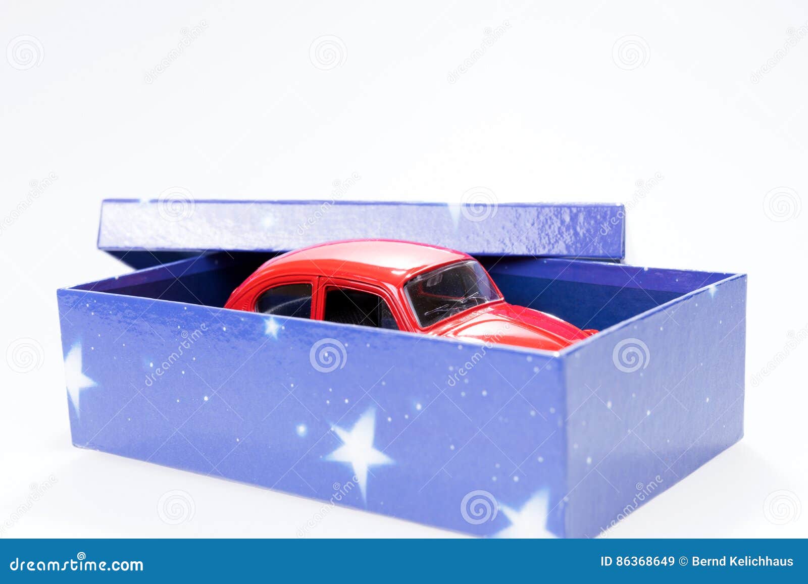 Red toy car in gift box stock image. Image of saving - 86368649