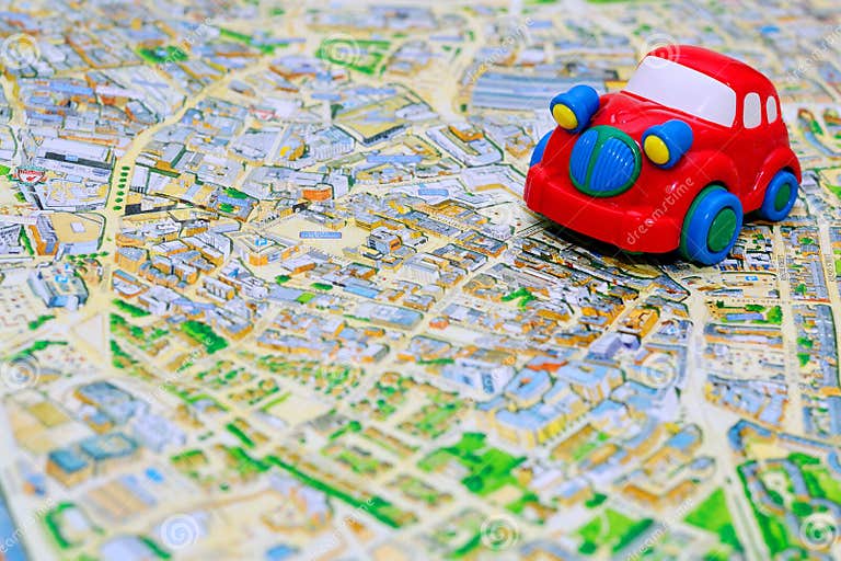 Red toy car on the map stock photo. Image of travel, plan - 28972338