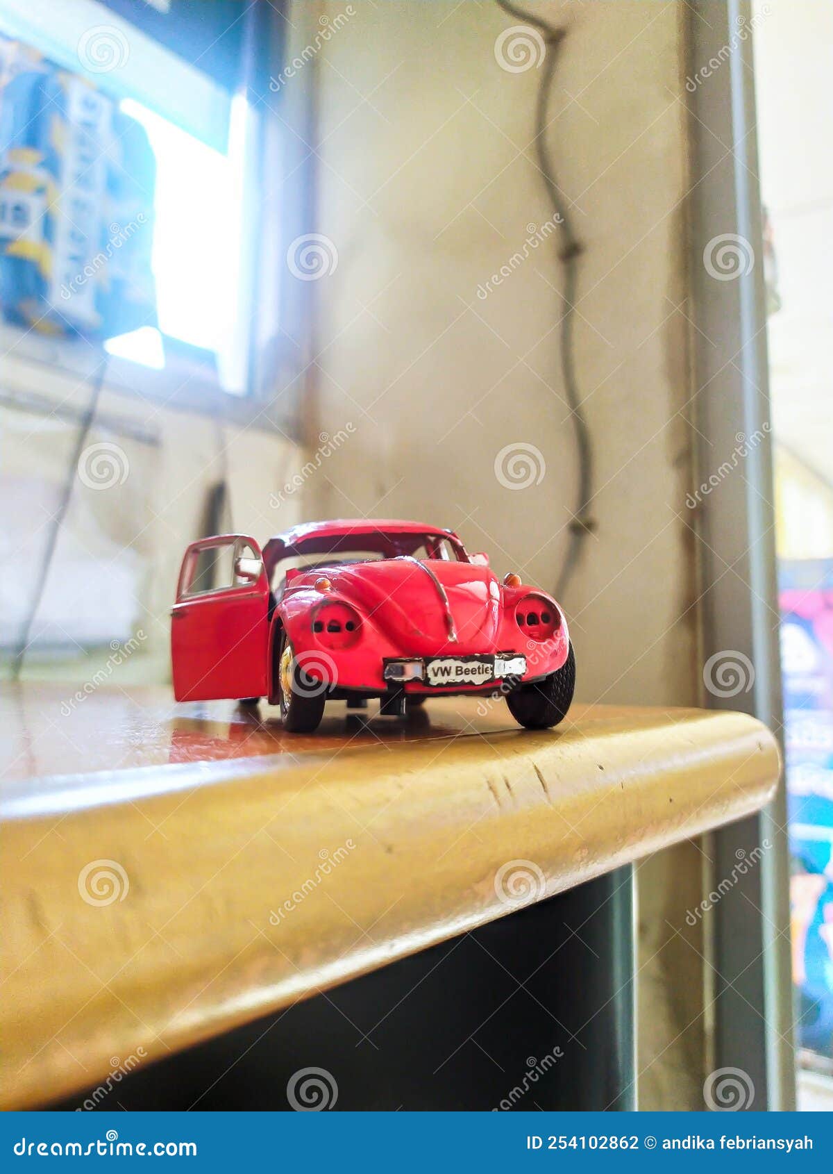 Red Toy VW Beetle on the Table Editorial Photography - Image of indoor ...