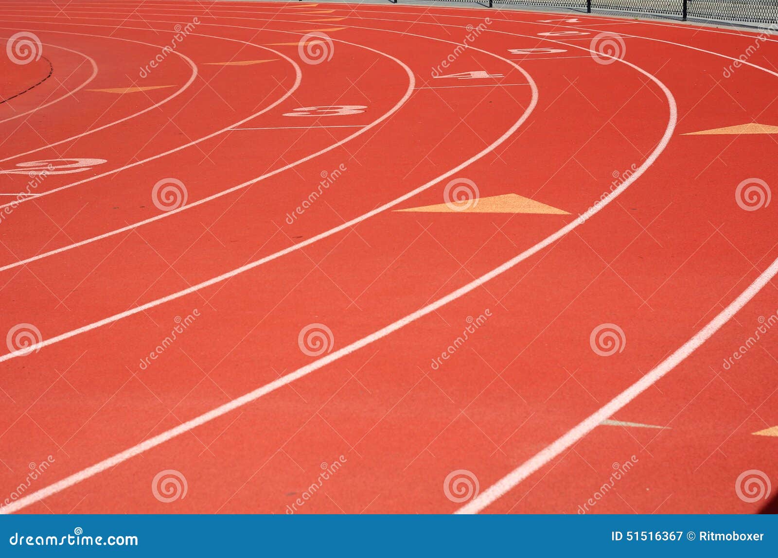 Red Track and Field lanes stock image. Image of compete - 51516367