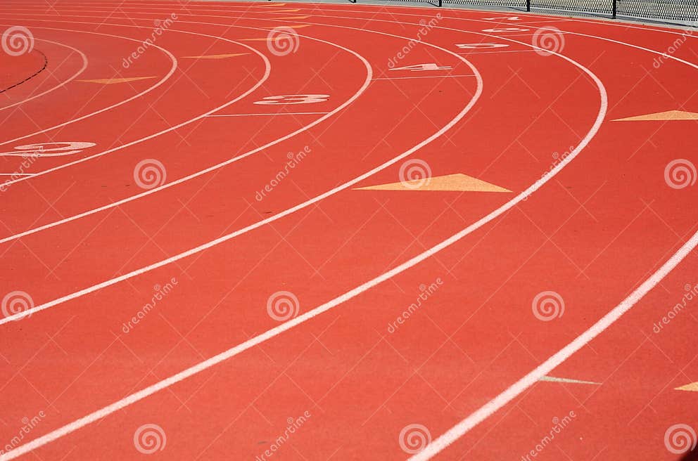 Red Track and Field lanes stock image. Image of compete - 51516367