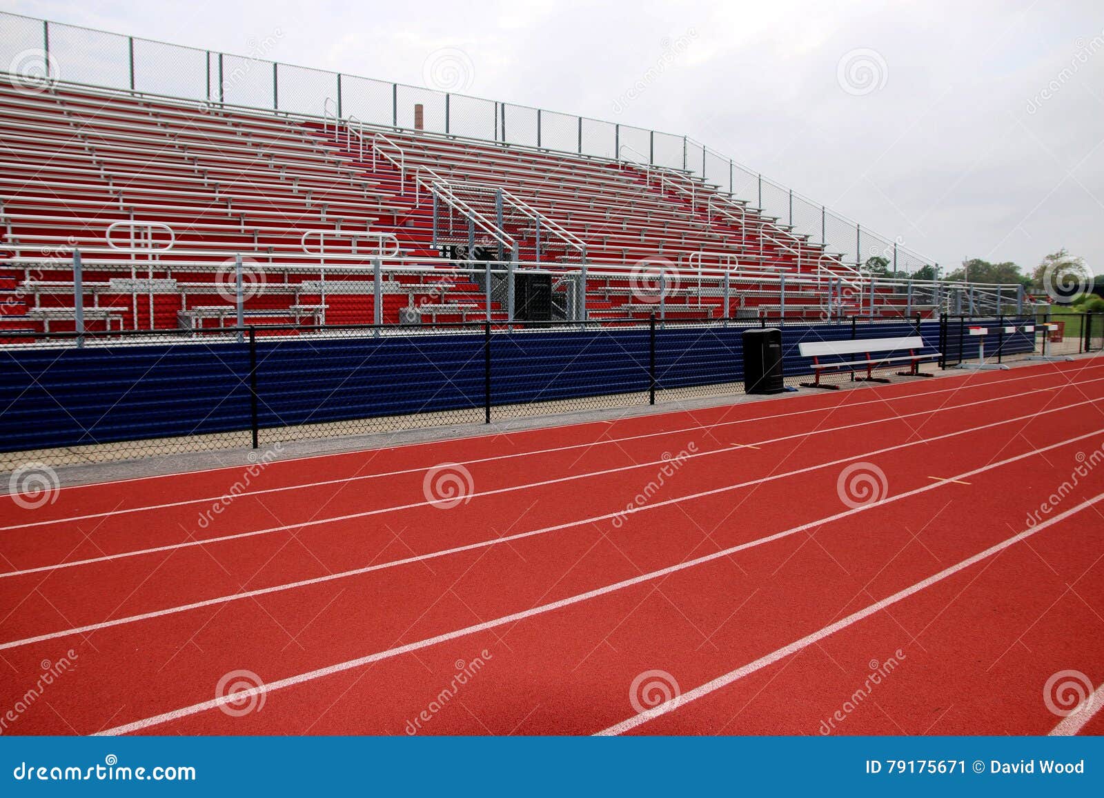 Red Track in Front of Red and Blue Bleachers Stock Image - Image of ...