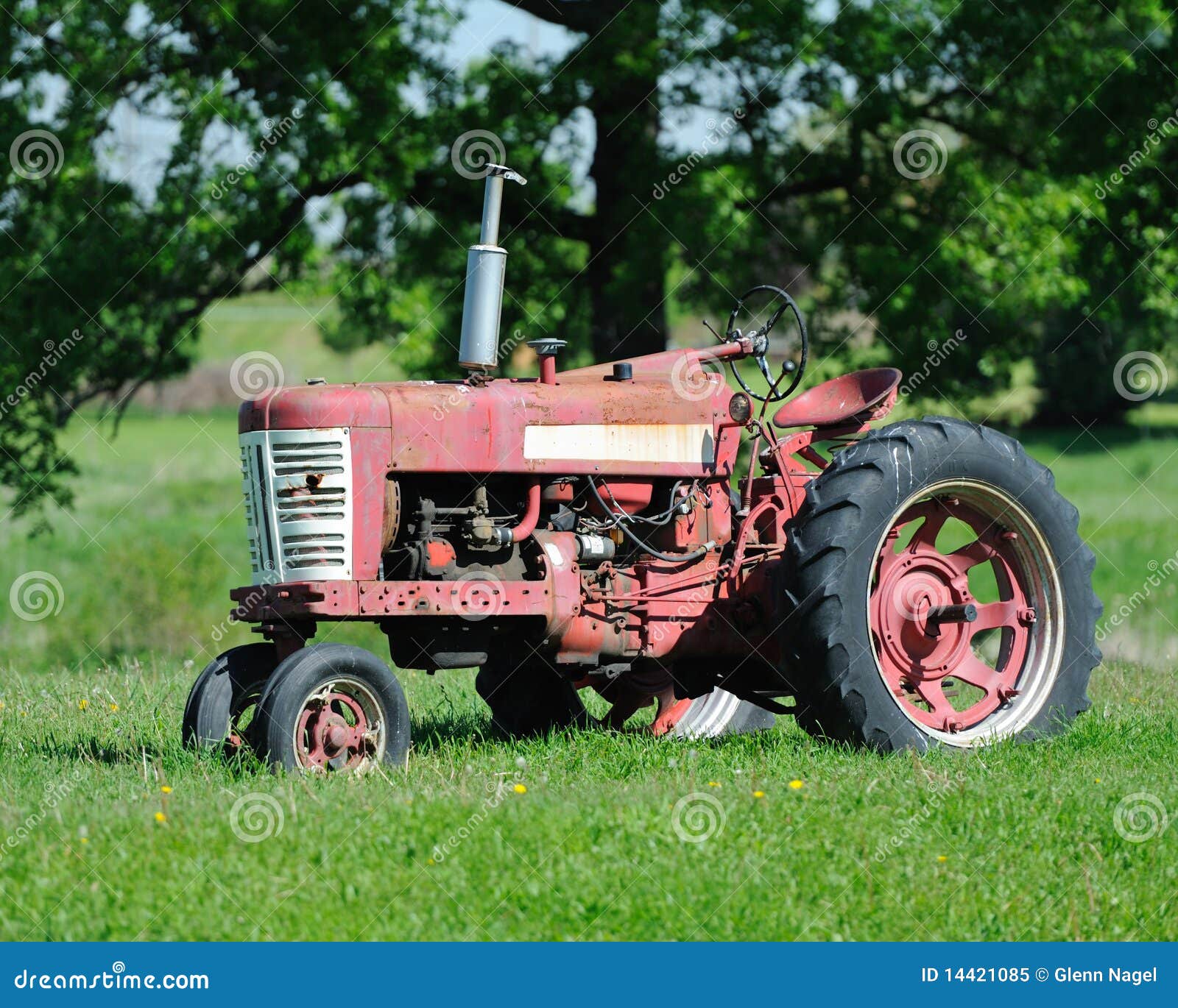 Red tractor stock image. Image of transportation, tires - 14421085