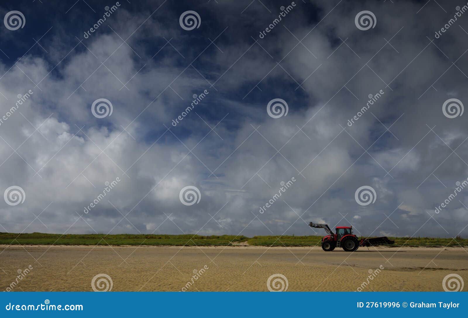 Red tractor on the beach stock photo. Image of vehicle - 27619996