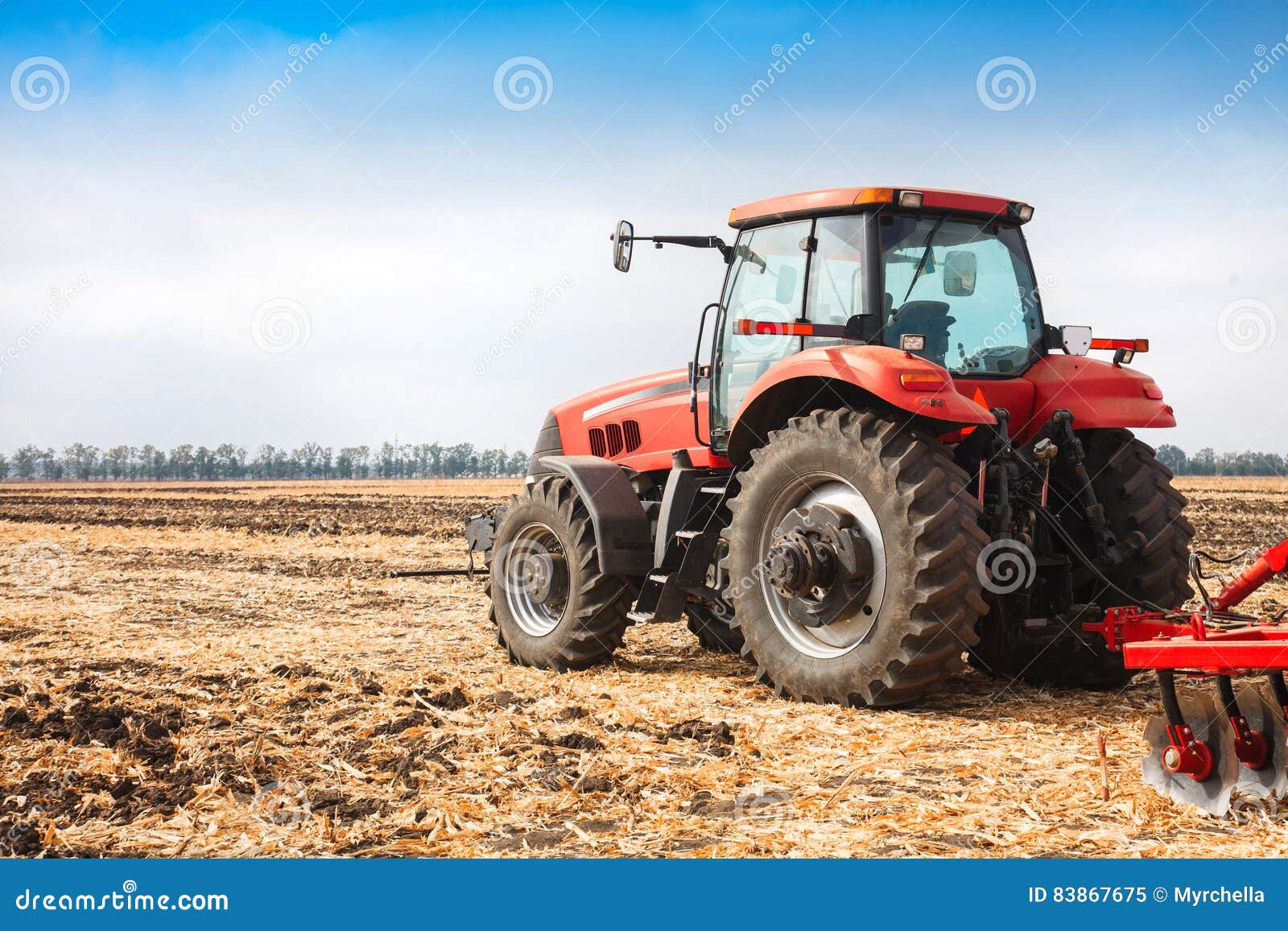 Red Tractor in the Field on a Bright Sunny Day. Stock Image - Image of ...