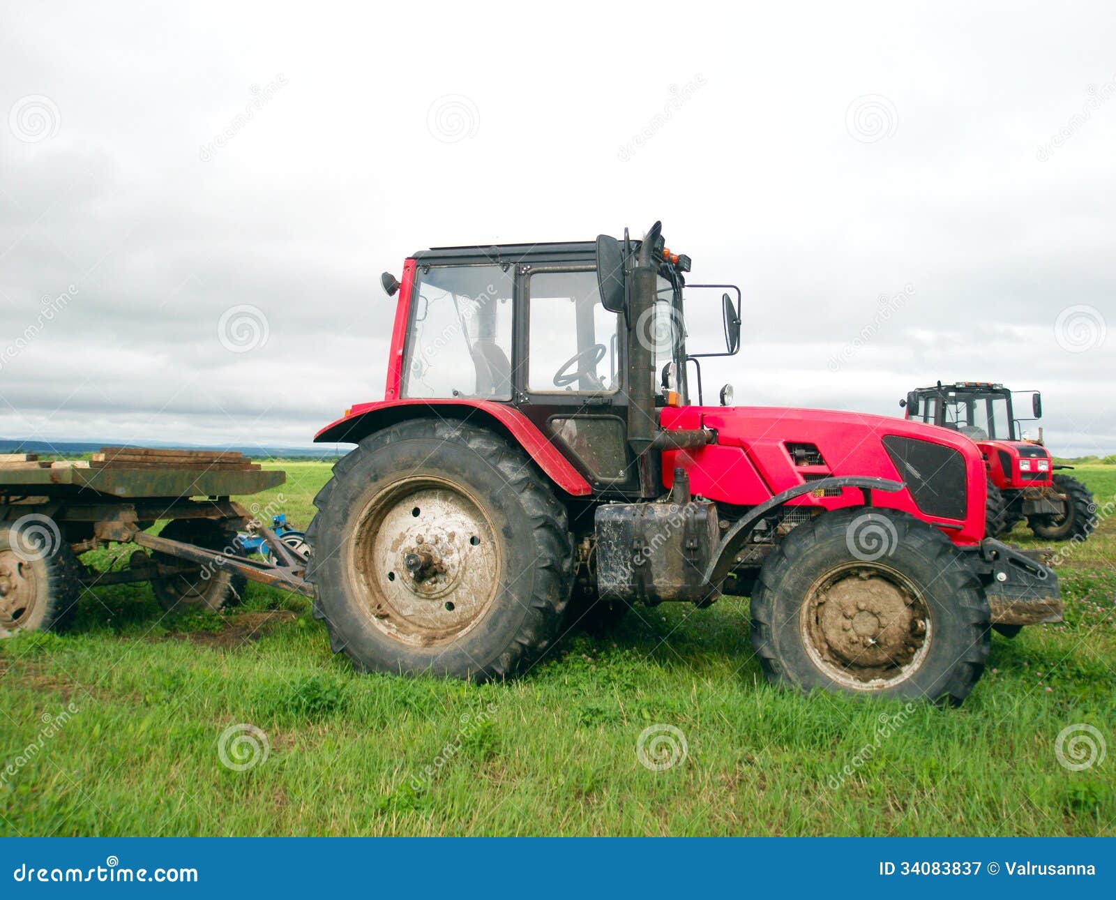 Red tractor in the field stock image. Image of grass - 34083837