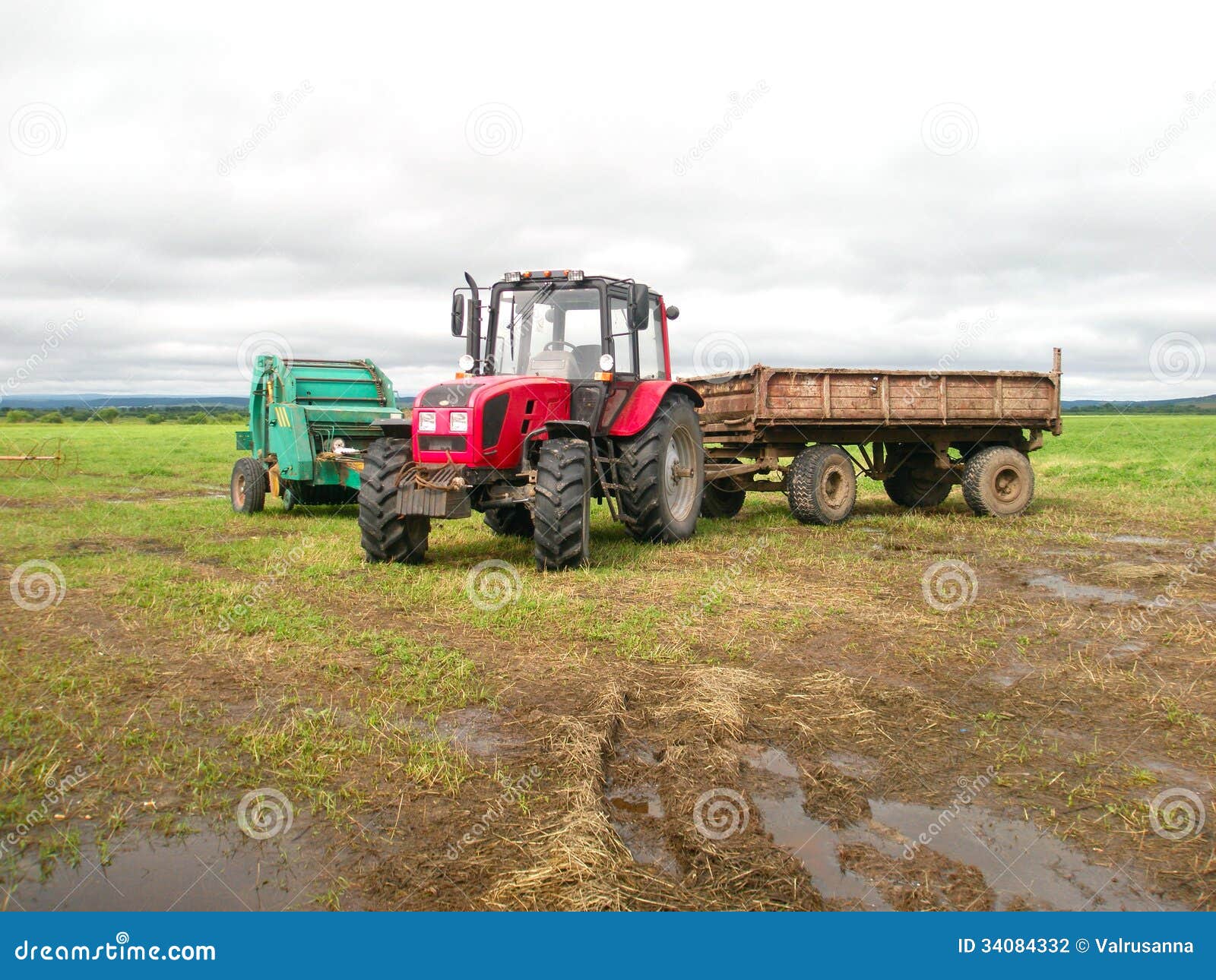 Red tractor in the field stock photo. Image of tractor - 34084332