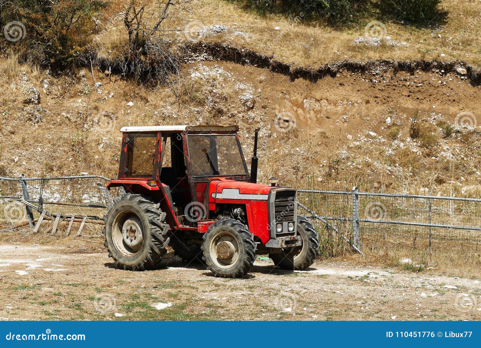 Red tractor field stock photo. Image of wheels, spring - 110451776