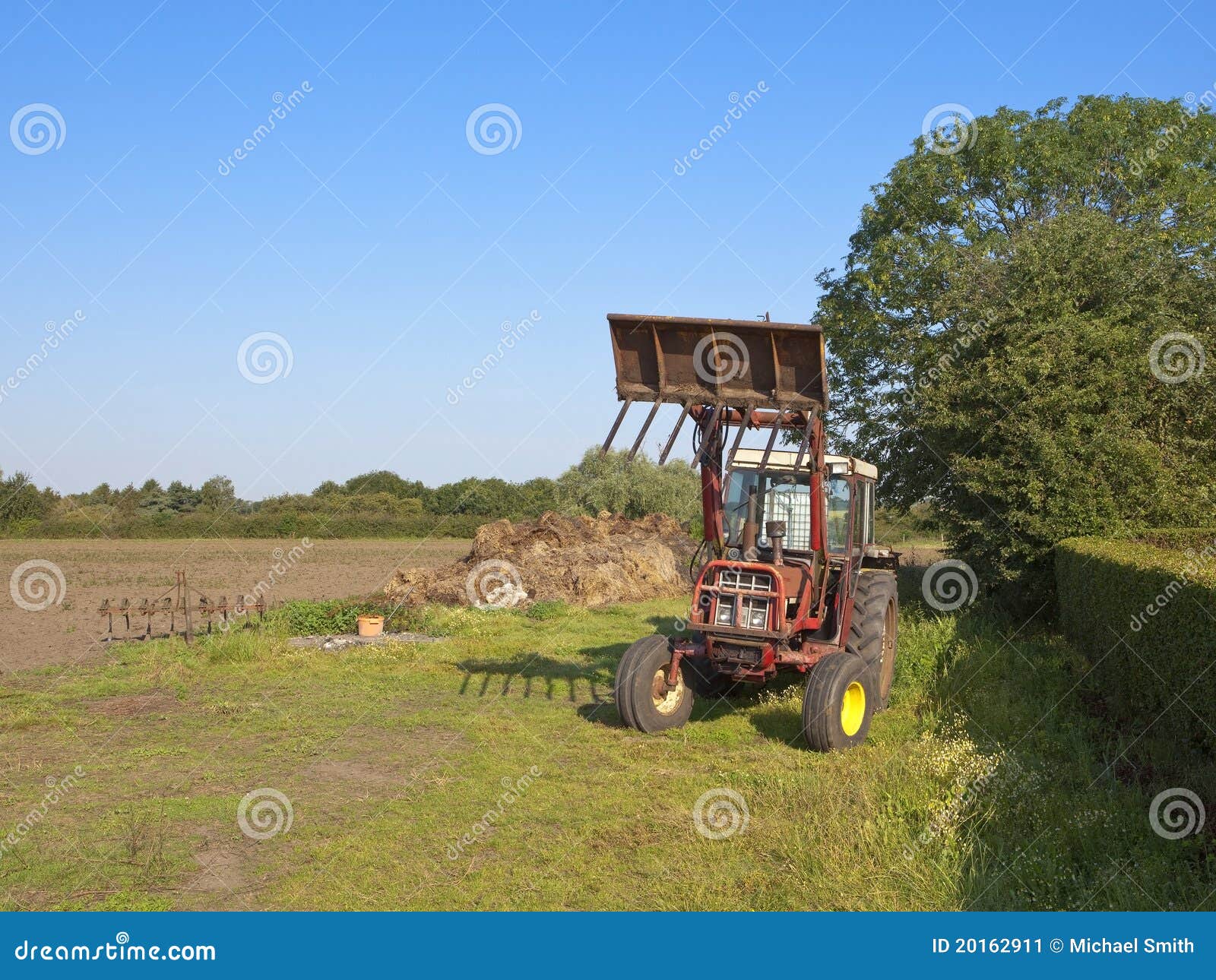 Red Tractor and Manure Heap Stock Image - Image of farm, fertilizer ...