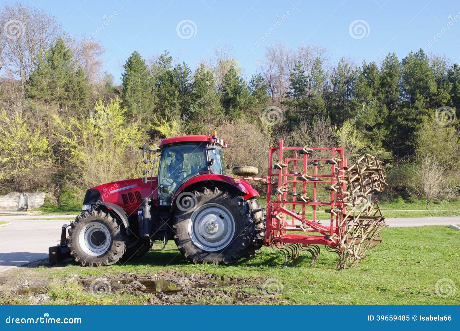 Red Tractor for Plowing on Grass Stock Image - Image of driven ...