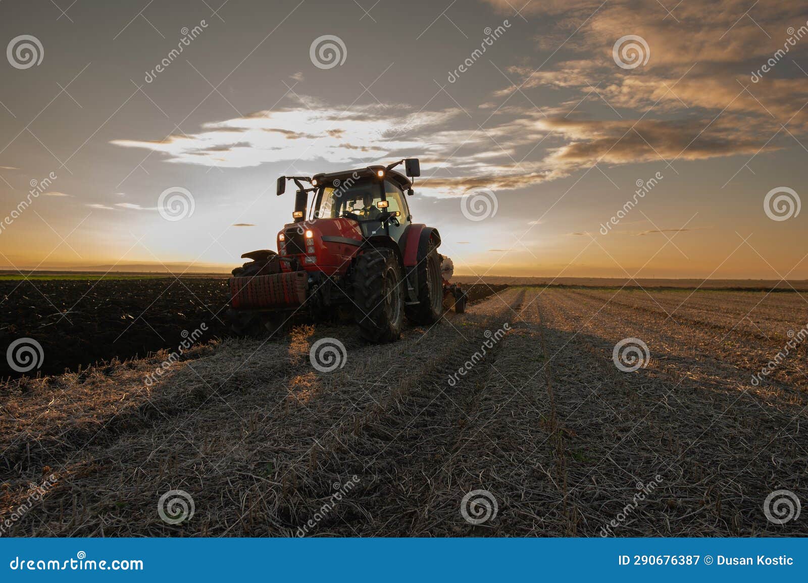 Red Tractor Plowing in Sunset Stock Image - Image of scene ...