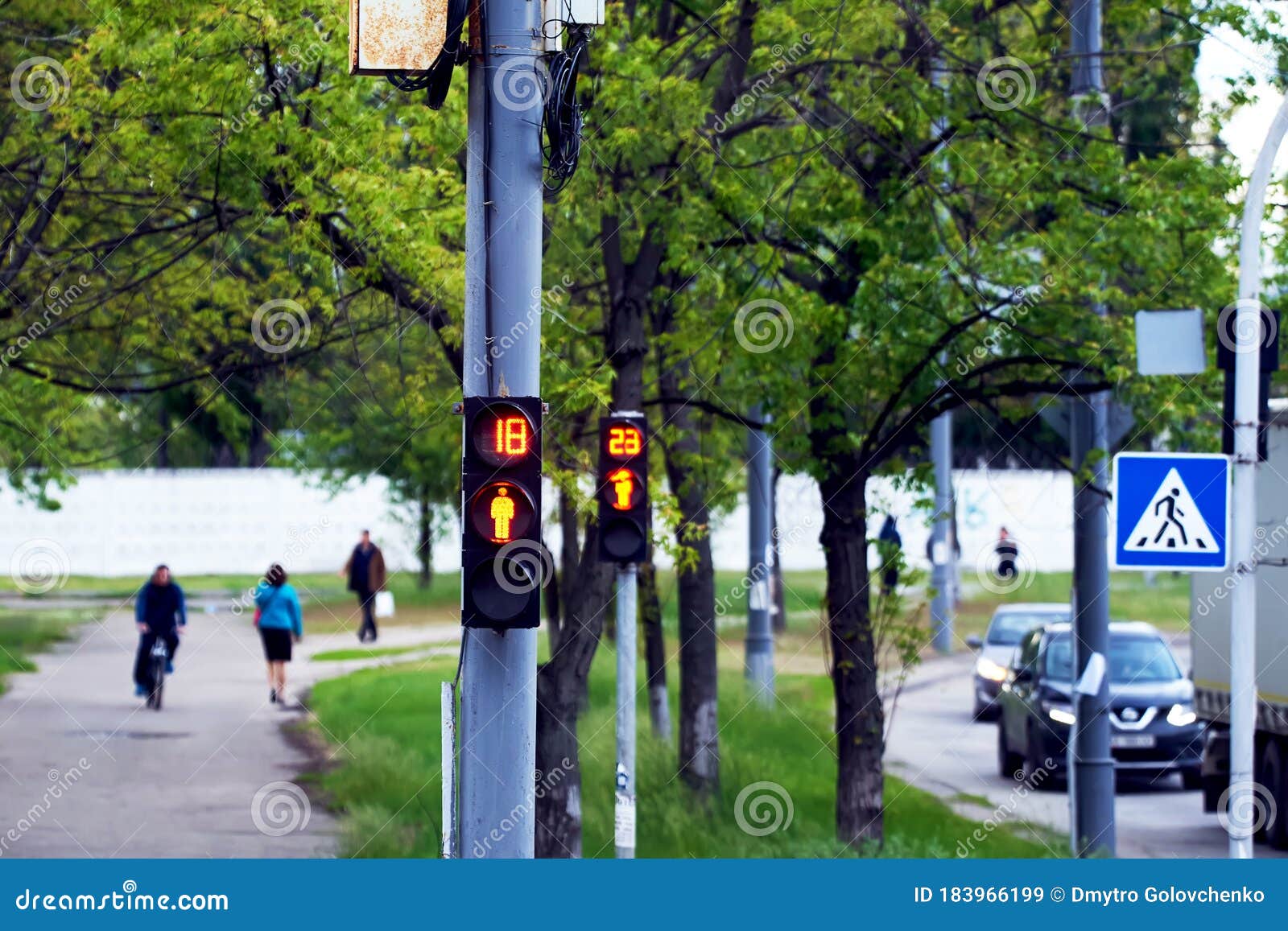 A Red Traffic Light Lights on the Roadway. a Red Man is on Fire with a ...