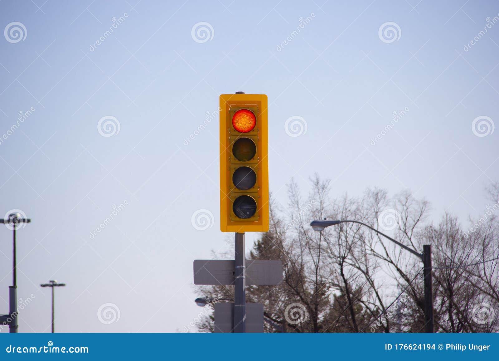Red Traffic Light in the Middle of an Intersection Stock Photo - Image ...