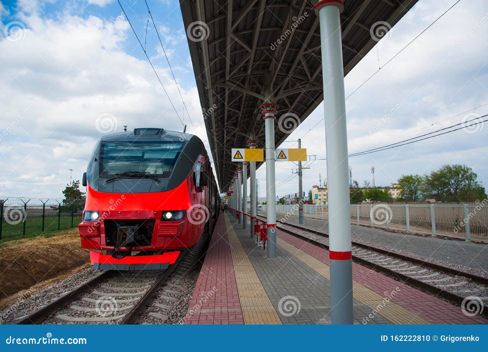 Red Train in Modern Railway Stock Photo - Image of journey, railway ...