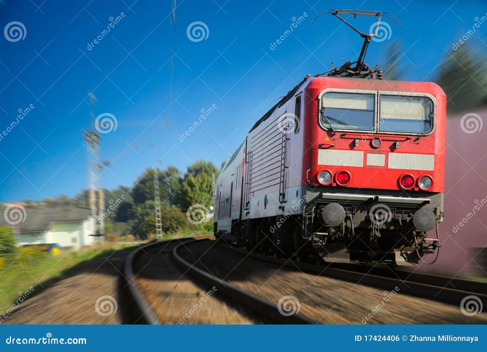 Red Train In Motion. Side View Of The Moving Train Runs On Railway In ...