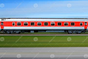 Red Train in Motion. Side View of the Moving Train Runs on Railway in ...