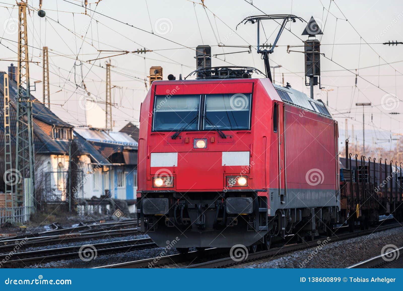 Red train on train tracks stock image. Image of railroad - 138600899