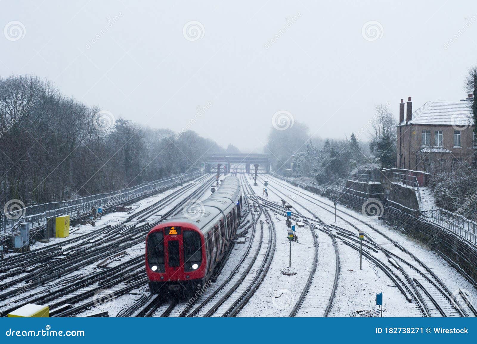 Red Train during Winter Covered with Snow Stock Image - Image of blue ...