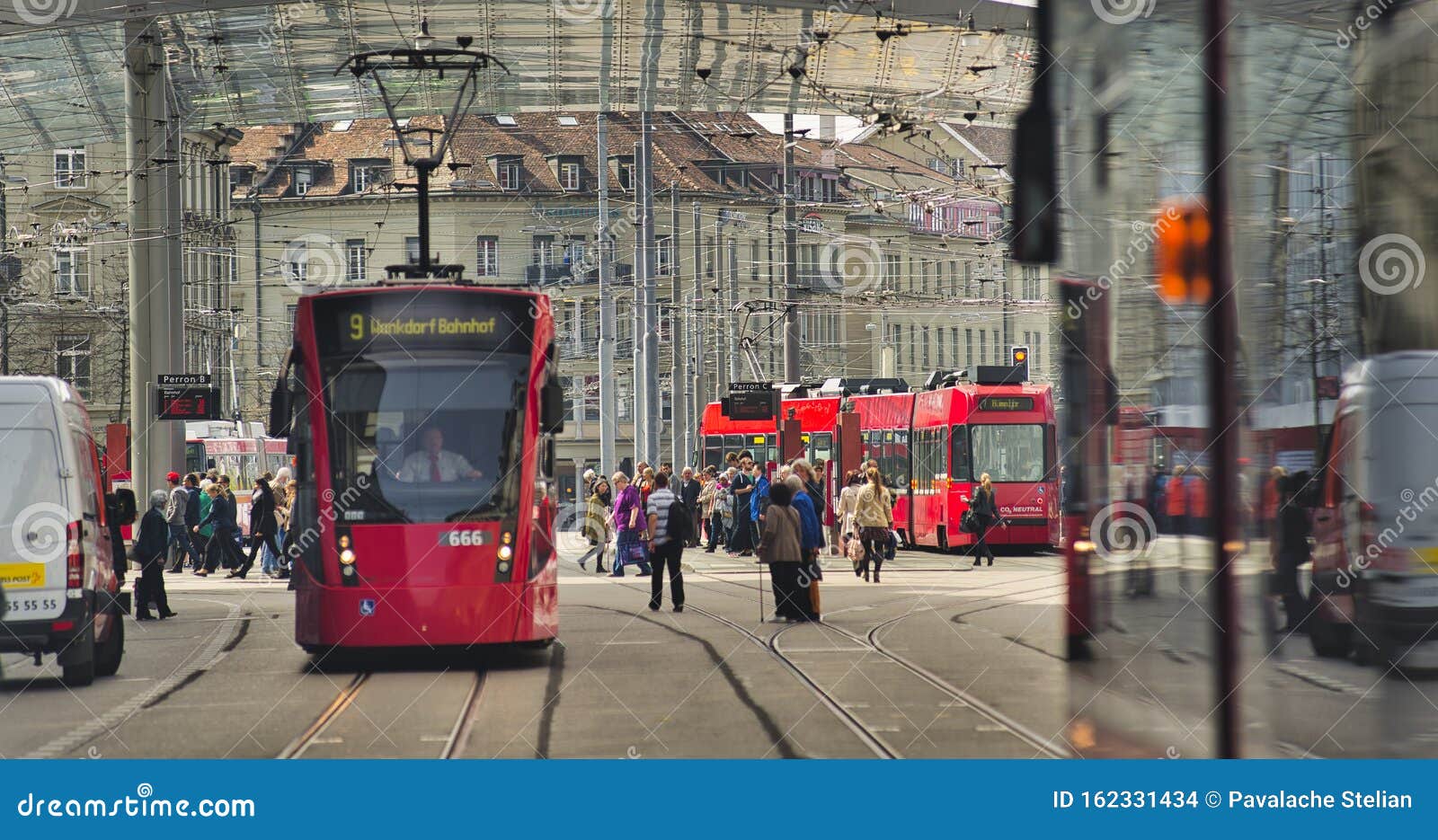 Red Tram at the Covered Stop at the Bern Railway Station. Editorial ...