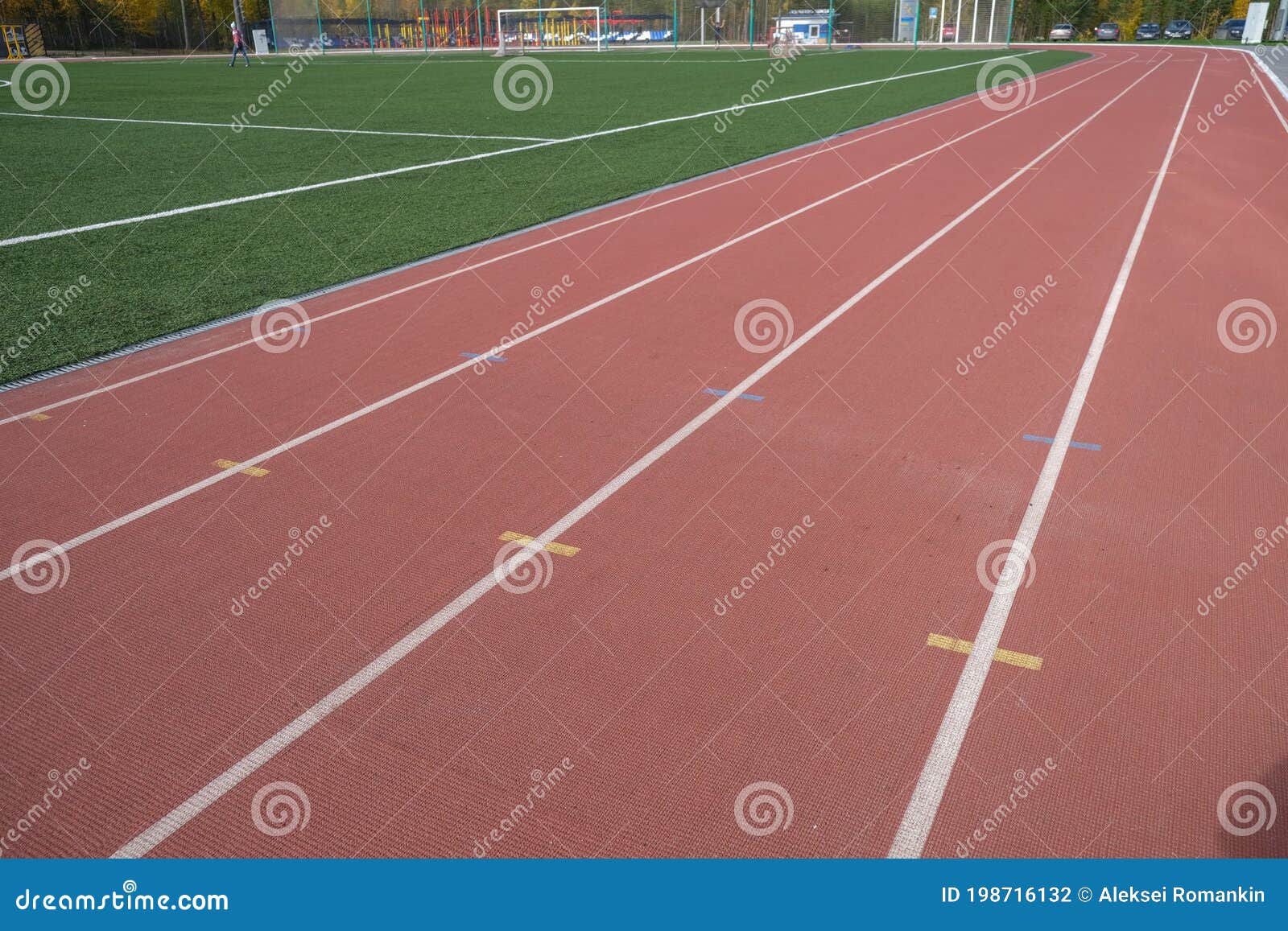 Red Treadmill Going into the Distance. Against the Background of Green ...