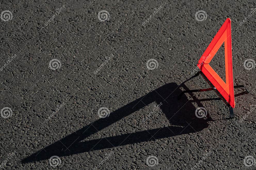 Red Triangle of a Car on the Road Stock Image - Image of automotive ...