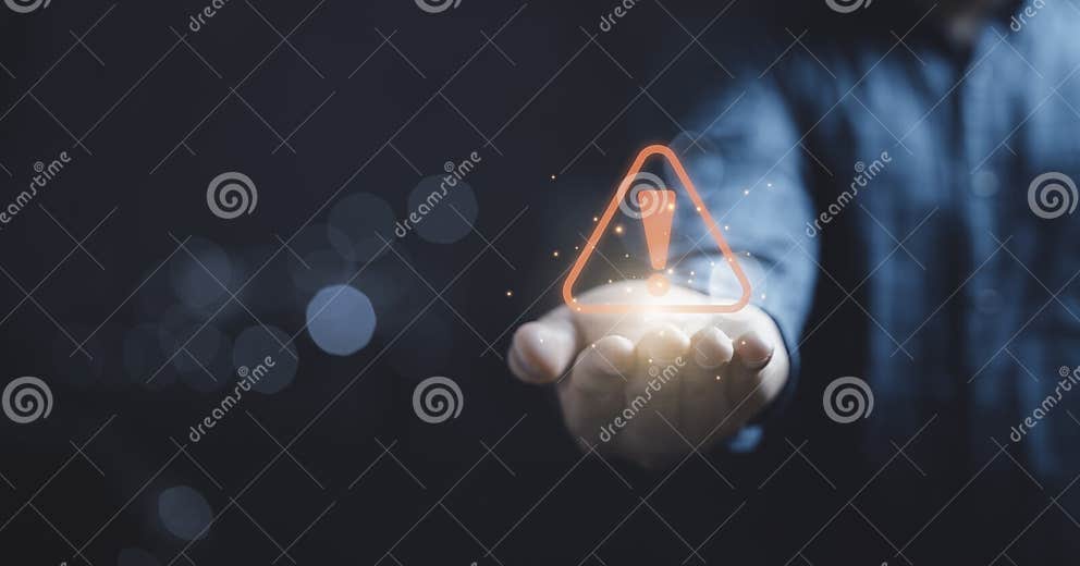 Red Triangle Caution Warning Sign on Hand for Maintenance Notification ...