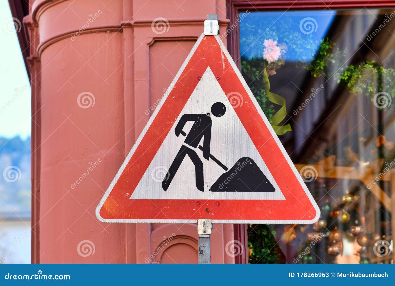 Red Triangular Construction Work Warning Traffic Sign in Front of ...