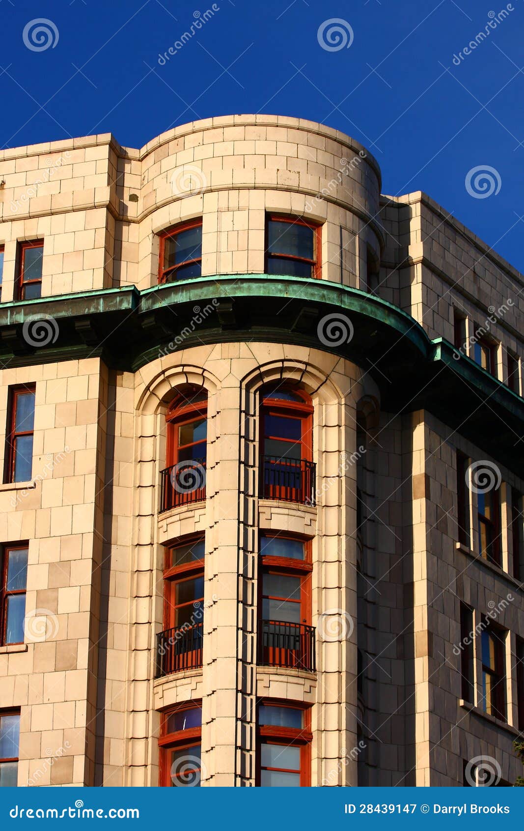 Red Trim Windows on Stone Building with Green Trim Stock Image - Image ...