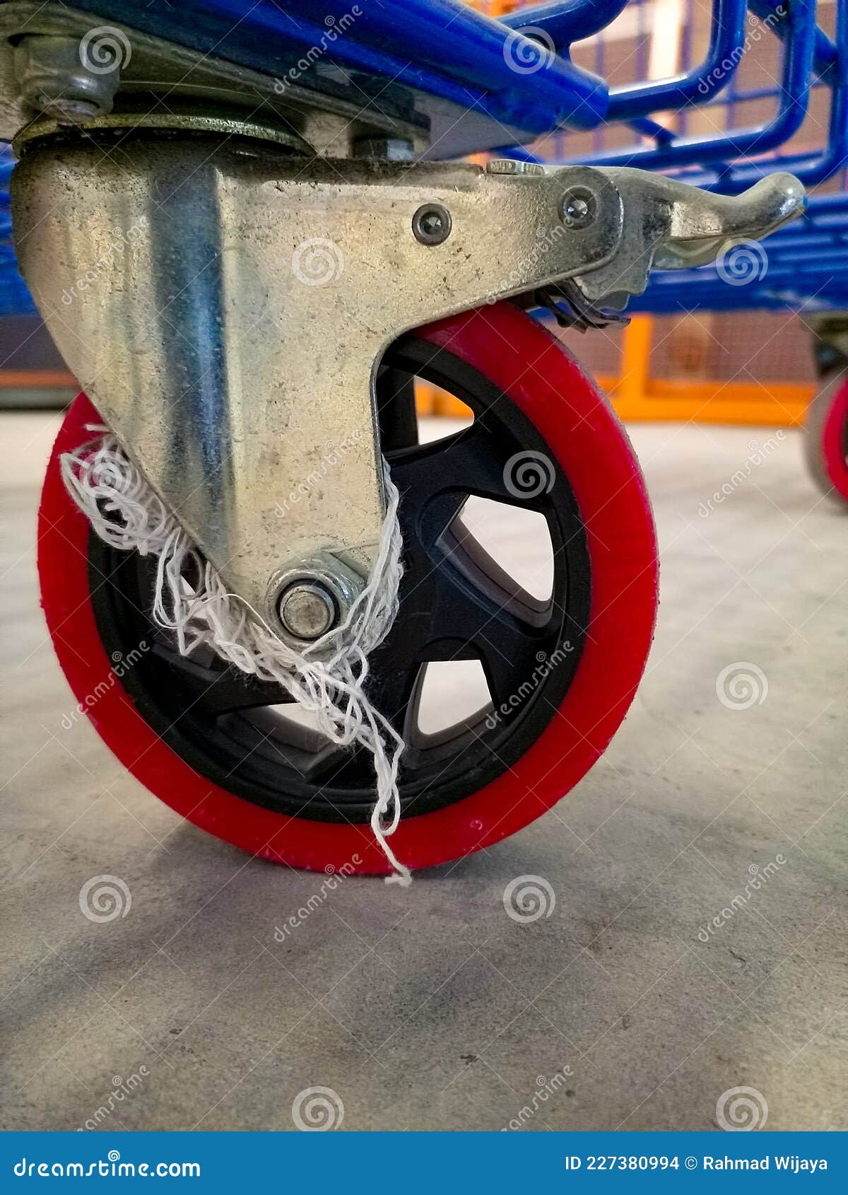 Red Trolley Wheel with Thread Stuck in Thmd Warehousing Area Stock ...