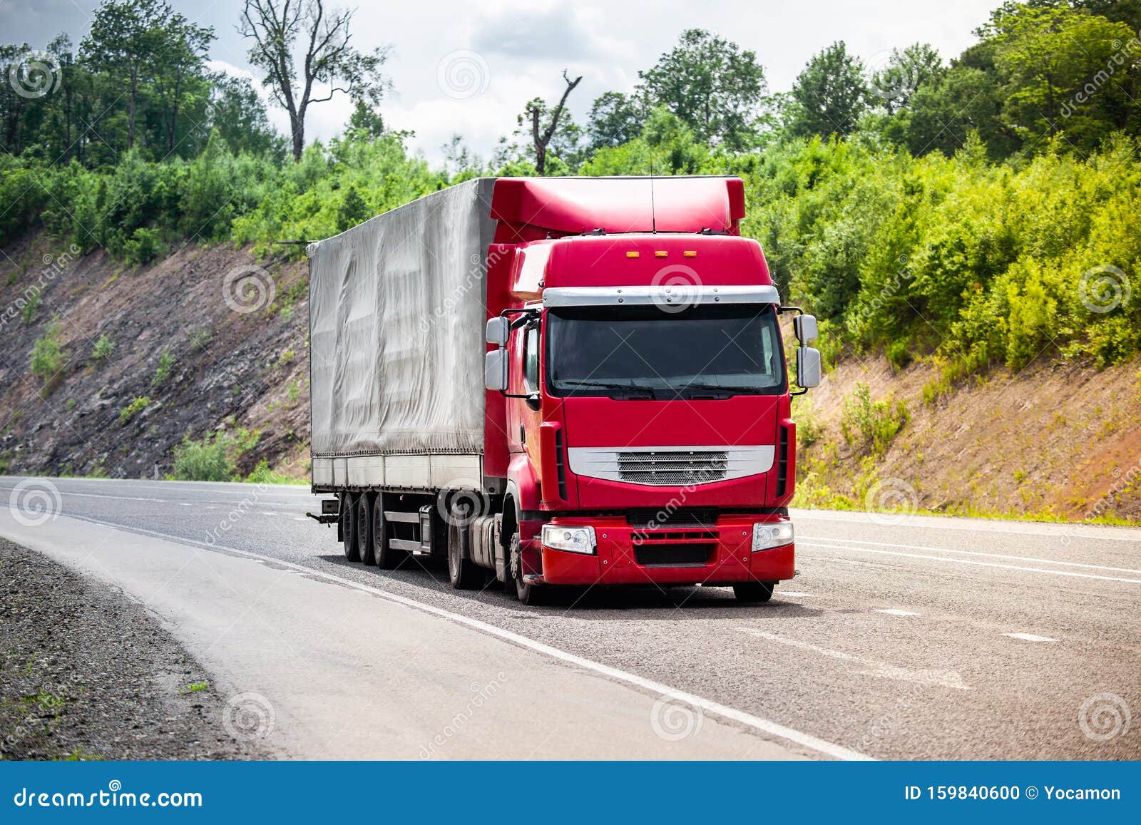 Red truck moving by a road stock photo. Image of moving - 159840600