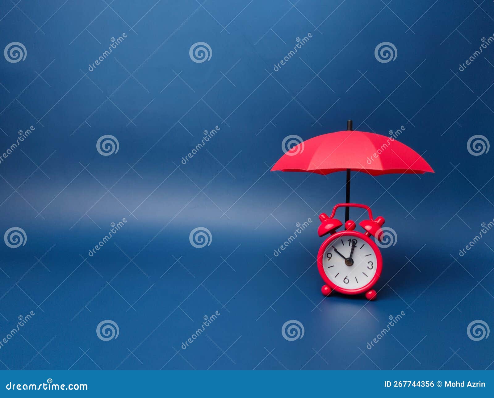 Red Umbrella and Red Clock on a Blue Background Stock Photo - Image of ...