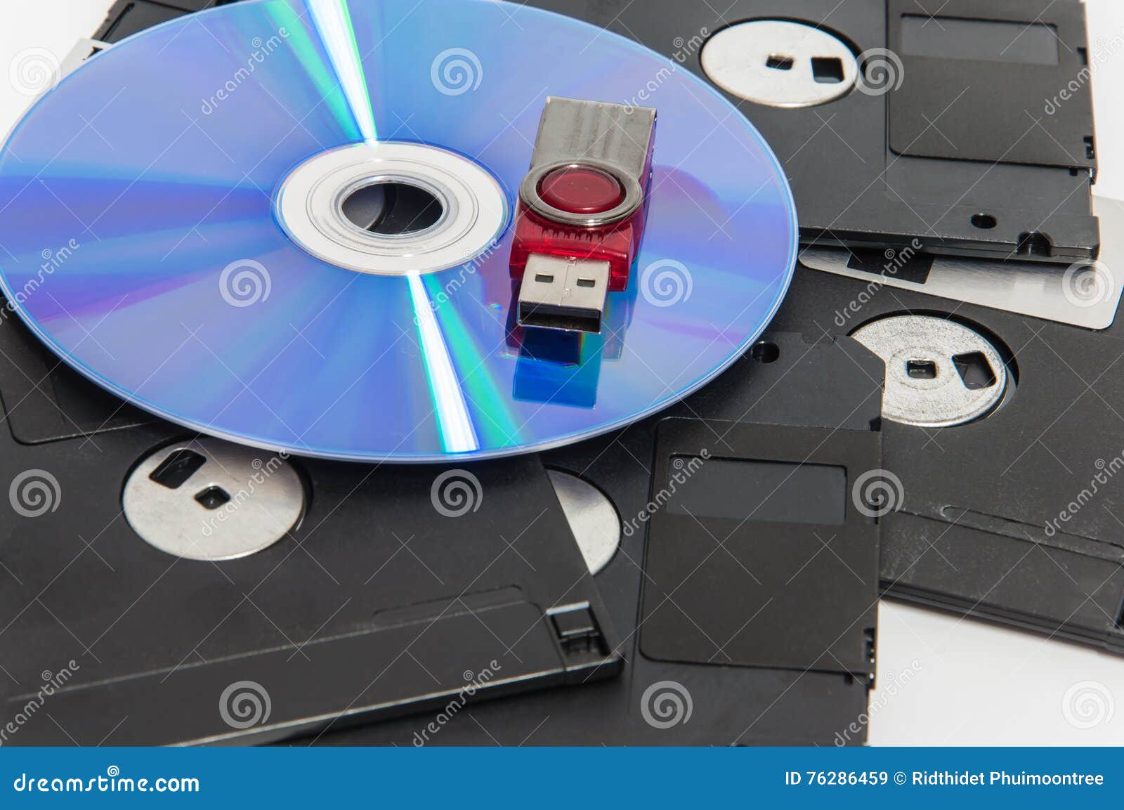 Red Usb Drive Put on Cd and Have Disket Under Them. Stock Image - Image ...
