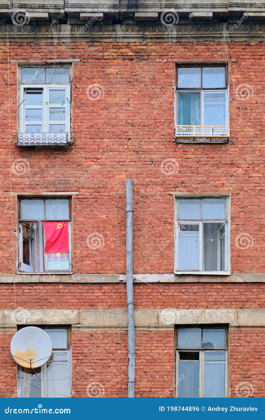 Red USSR Flag Hung on an Old Window in Russia, Moscow Stock Photo ...