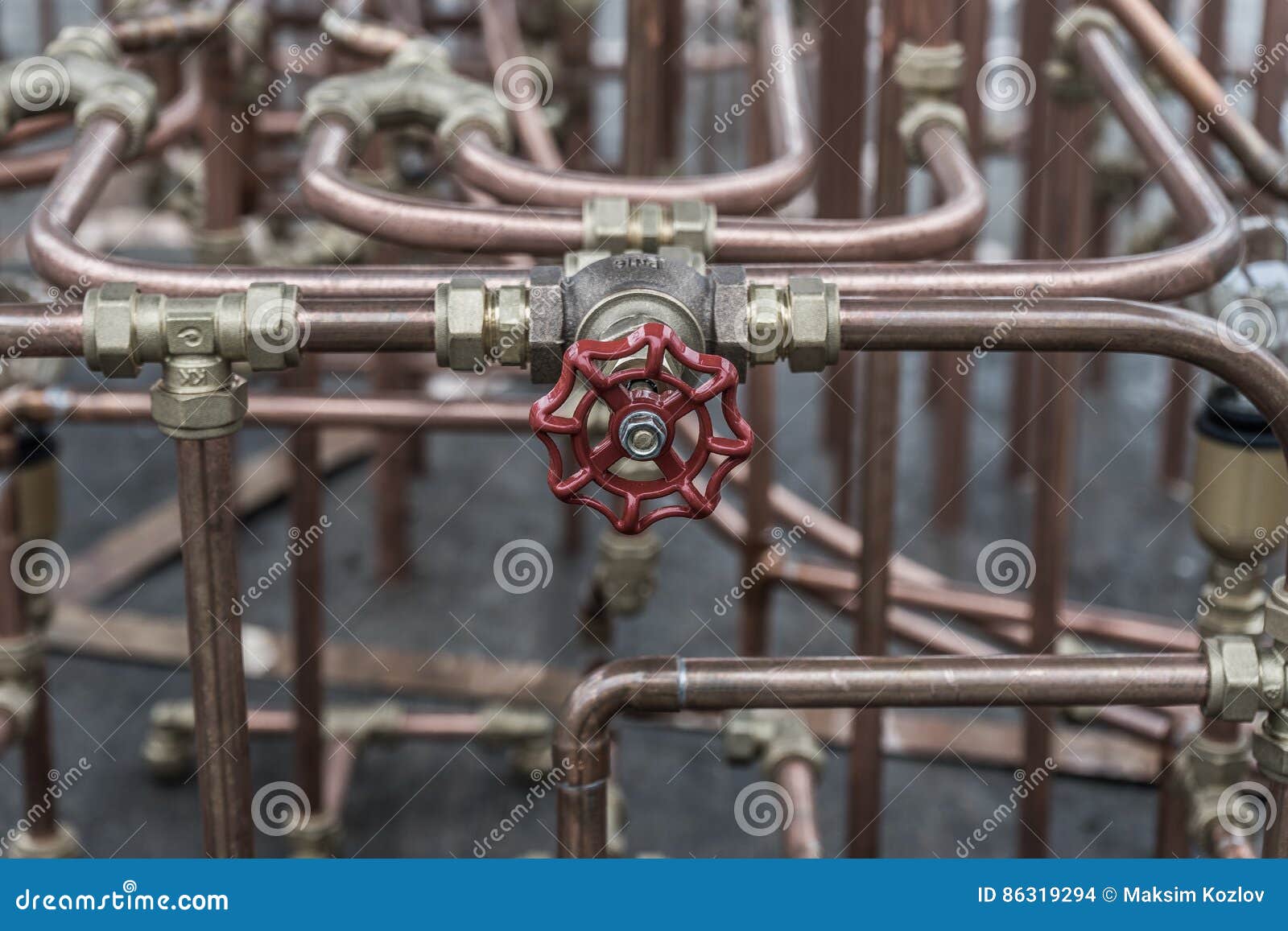 Red Valve on Copper Pipe Construction in Outdoor Stock Photo - Image of ...