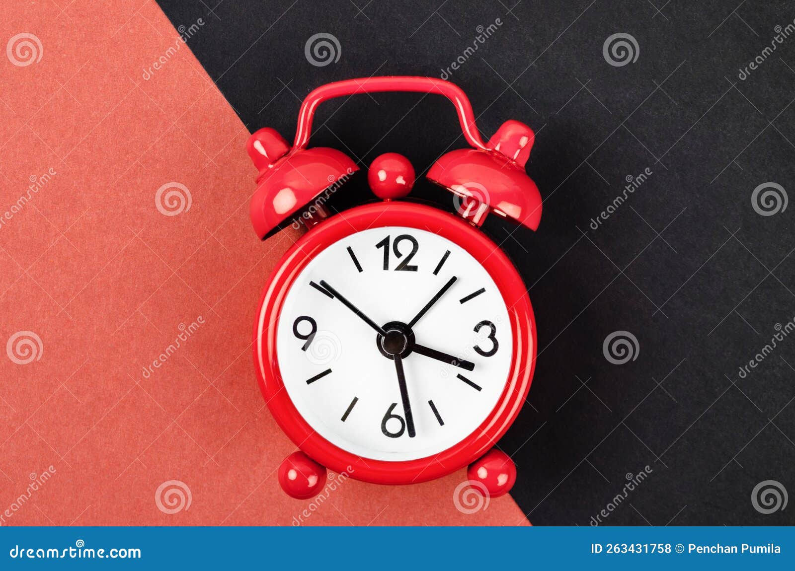 The Red Vintage Alarm Clock on Red and Black Colour Background Stock ...