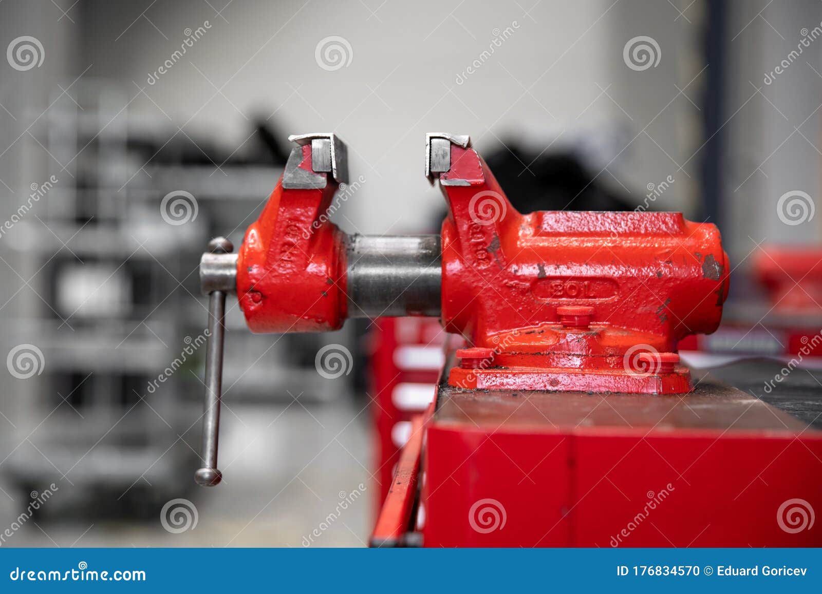 Red Vise on Table in Factory Stock Photo - Image of handle ...