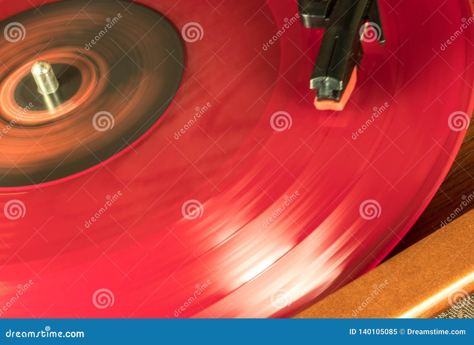 Red Vynil Disc Is Being Played Stock Photo | CartoonDealer.com #140105016