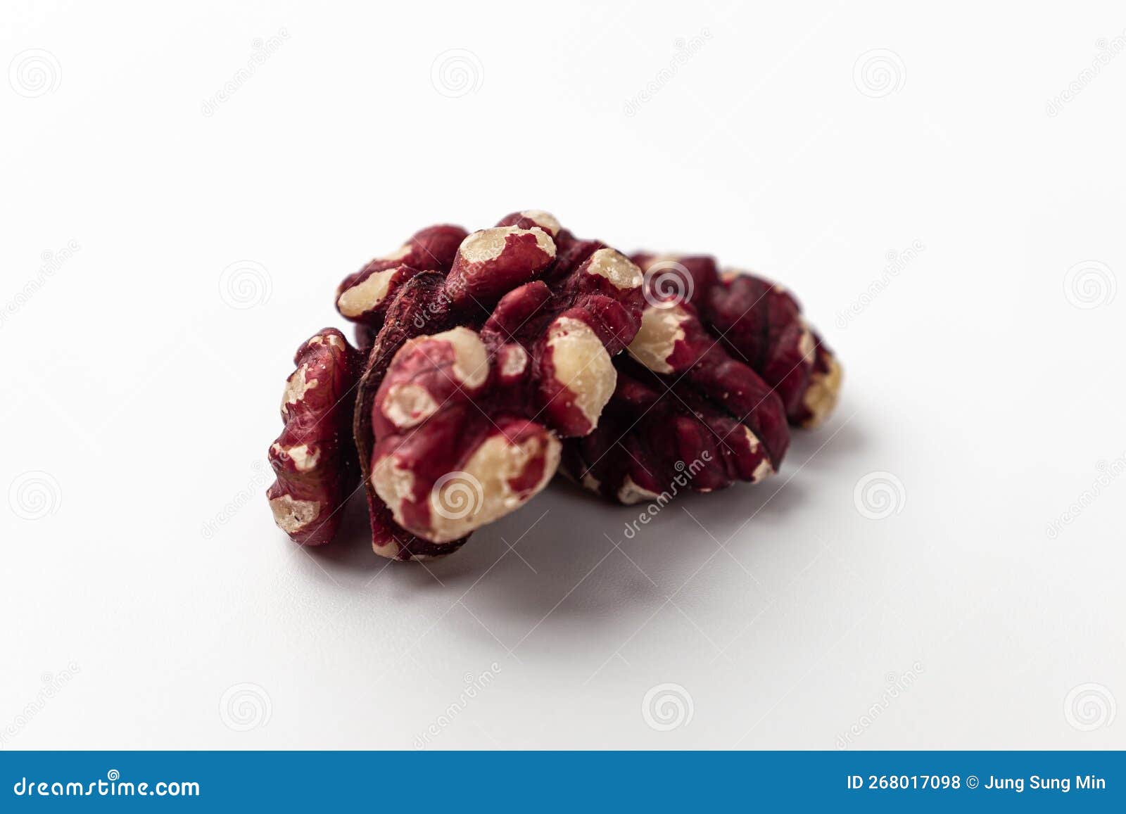 Red Walnuts on a White Background Stock Photo - Image of food, light ...