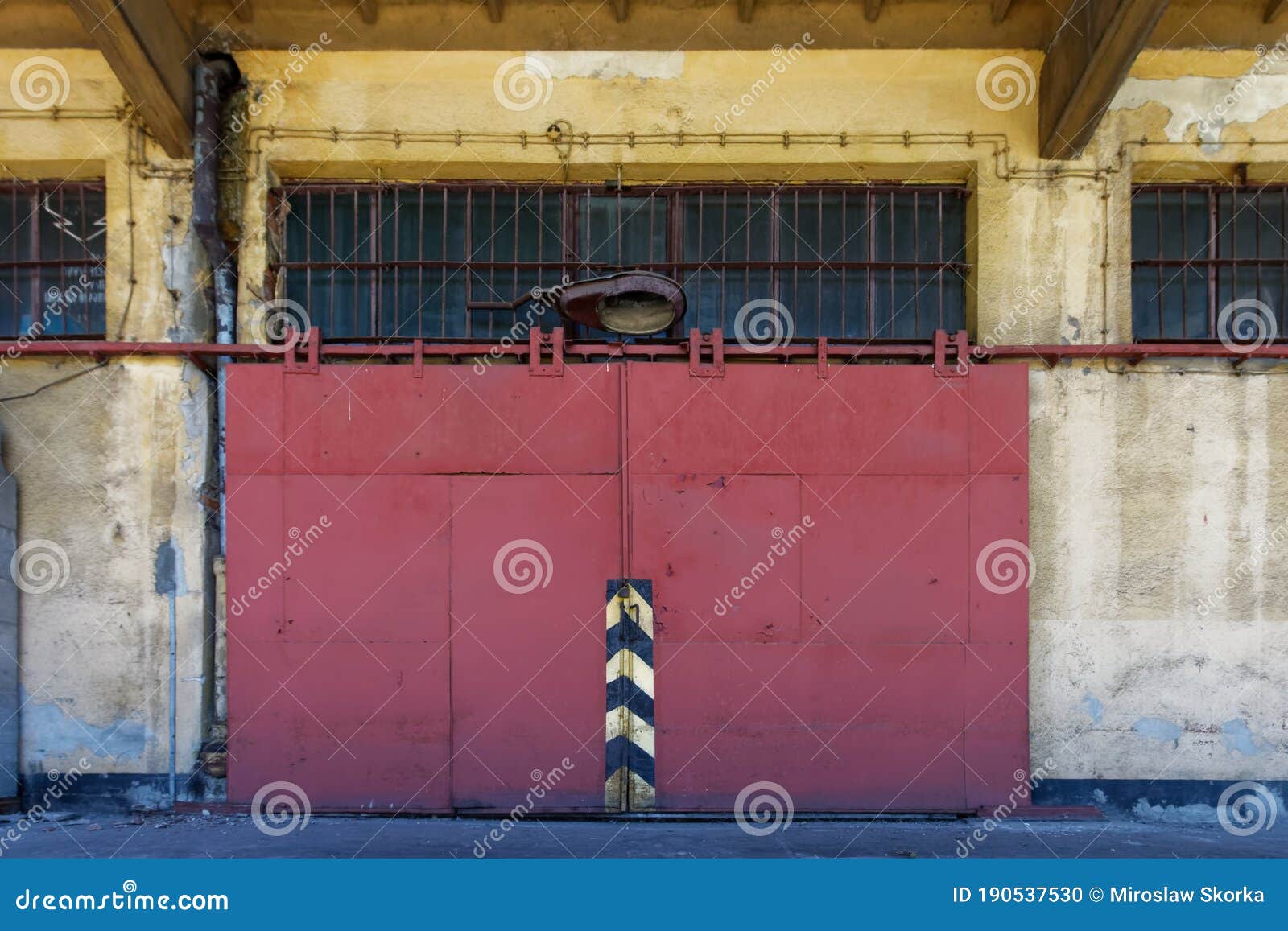Red warehouse gate stock photo. Image of abandoned, textured - 190537530